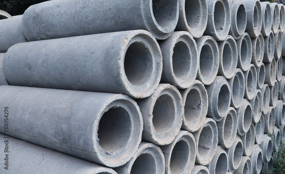 Precast reinforced concrete pipes laying on the ground Stock Photo ...
