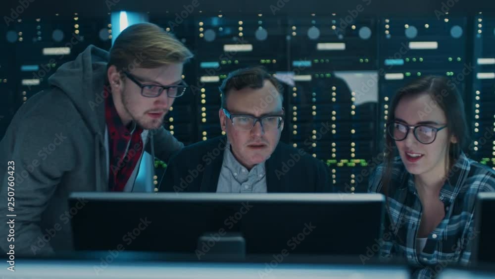 Male and Female IT Engineers / Programmers Having Discussion about ... Male and Female IT Engineers / Programmers Having Discussion about ...