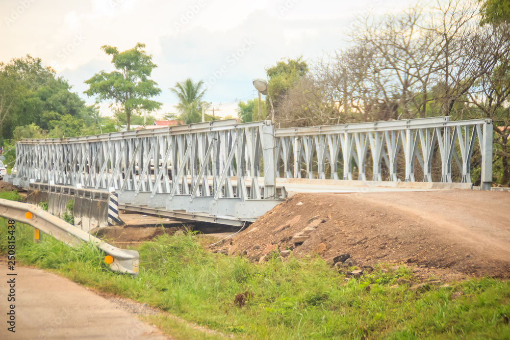 New temporary steel bridge is replace the reinforce concrete bridge ...