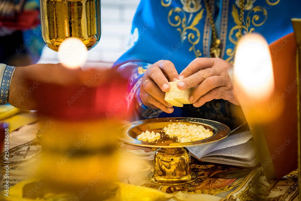 the priest prepares the sacrament, the sacrament, the Sacrament of the ...
