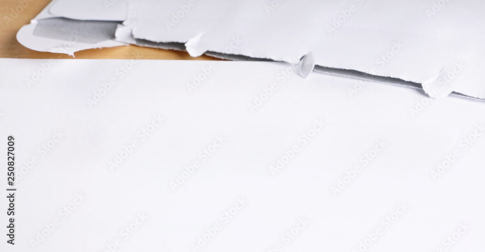blank letter and opened envelope on desk Stock Photo | Adobe Stock