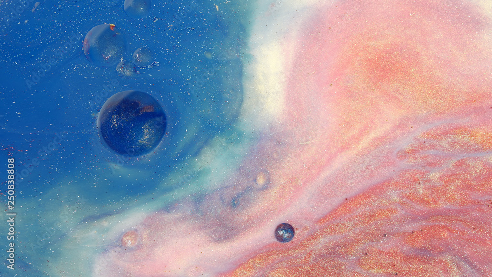 Colorful sparkling paints mix in beautiful patterns. Oil ink of blue ...