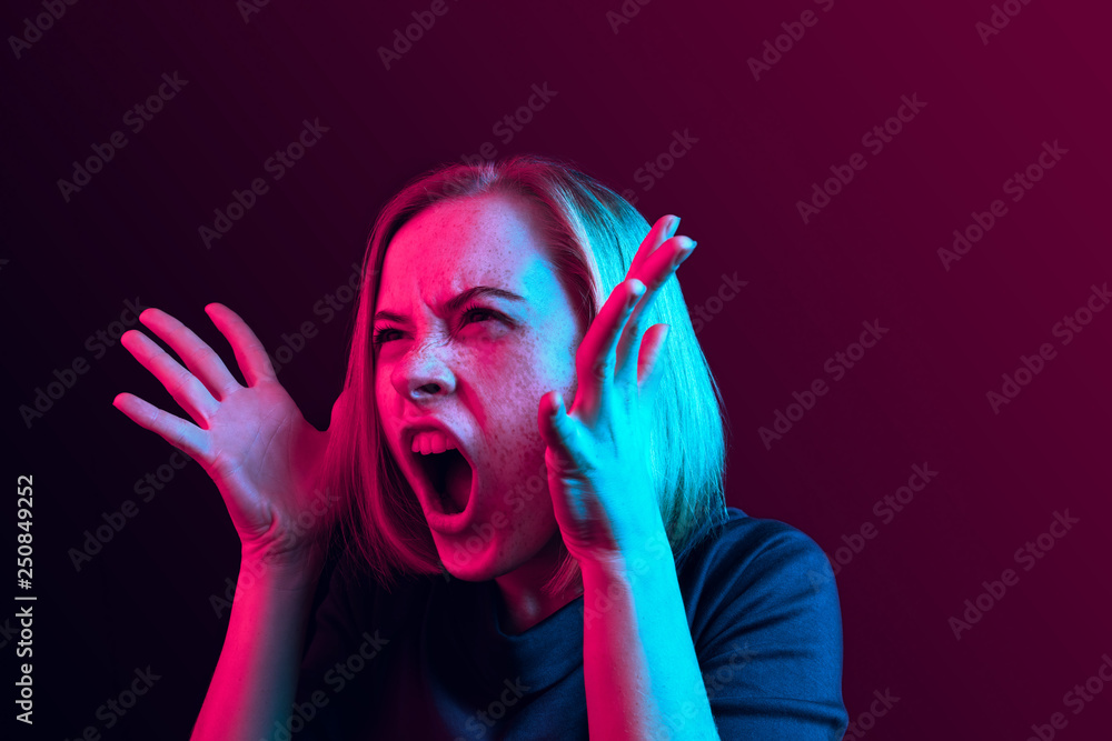 Screaming, hate, rage. Crying emotional angry woman screaming on neon ...