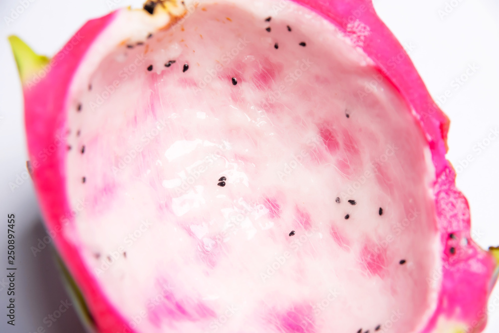 Exotic fruit. Dragon fruit. Red pitaya. Pitahaya pulp with black seeds ...