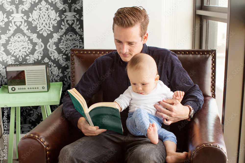 Father reading book to his son Stock Photo | Adobe Stock
