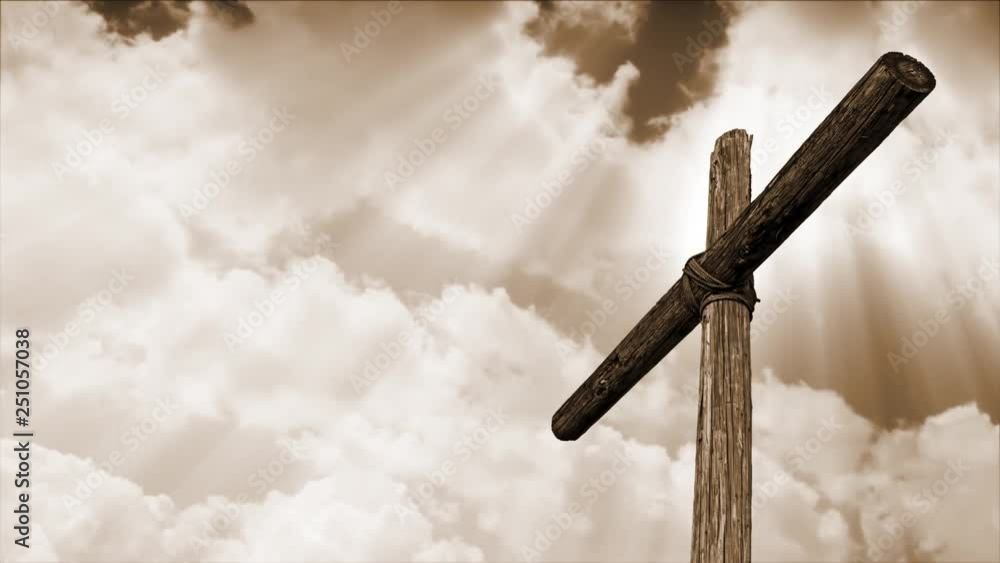 Looping time lapse motion clouds with an old rugged wooden cross in ...