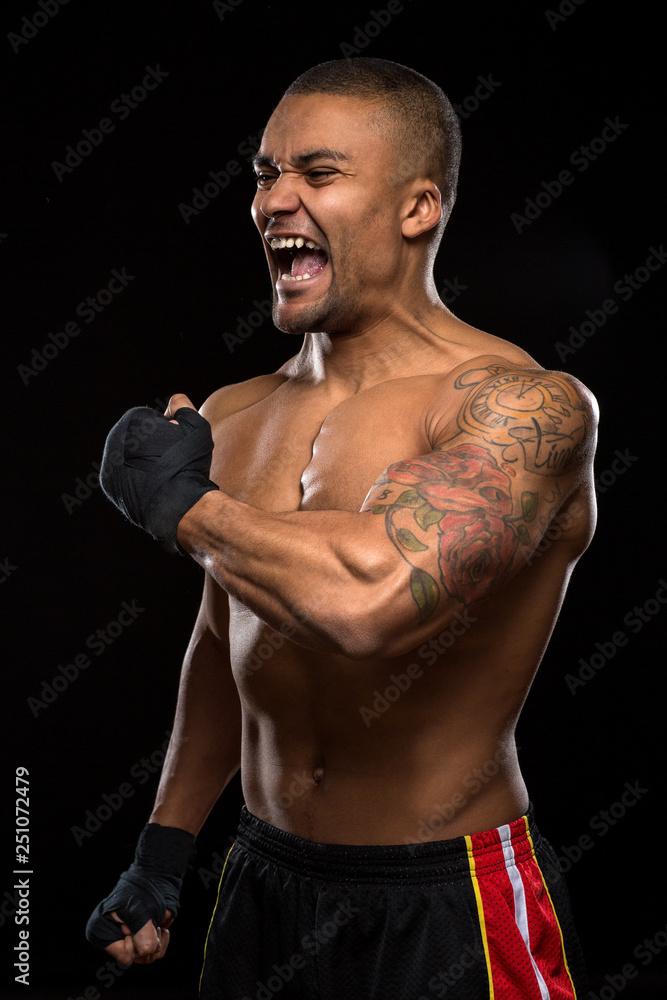 Muscular shirtless male fighter on black background Stock Photo | Adobe ...