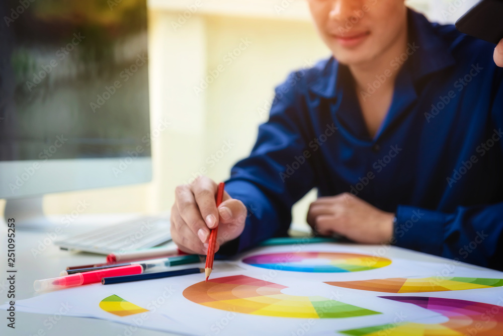 Graphic designer man creative using Color swatch samples for website ...