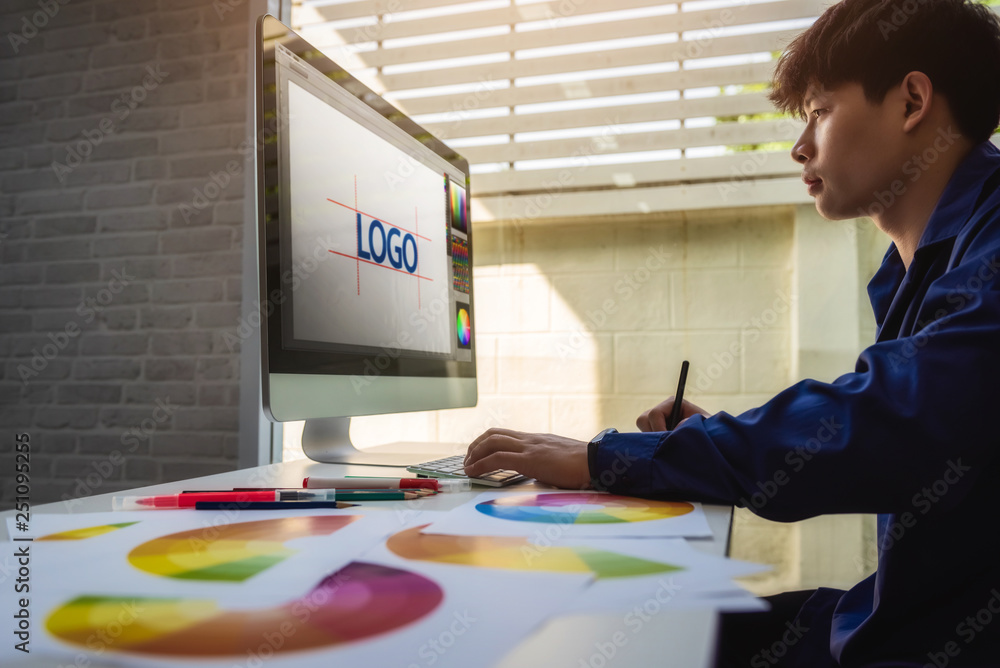 Graphic designer man creative using Color swatch samples for website ...