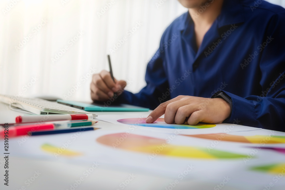 Graphic designer man creative using Color swatch samples for website ...