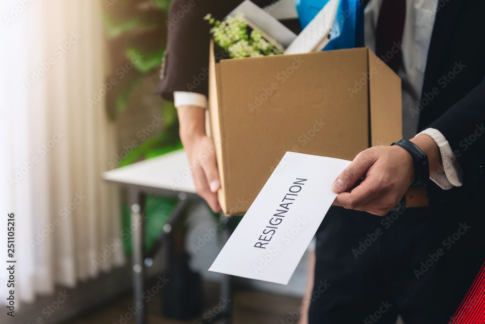 Business man hand sending resignation letter for stress from working ...
