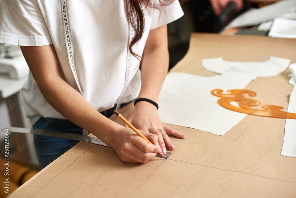 Workplace in design studio, pattern creation process. Female designer ...