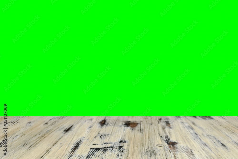 old painted washed oak wood table on the blurry chroma key green screen ...