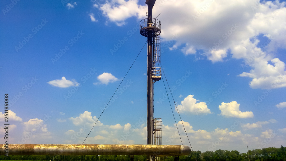 Flare for flaring associated gas. The end point of the pressure relief ...