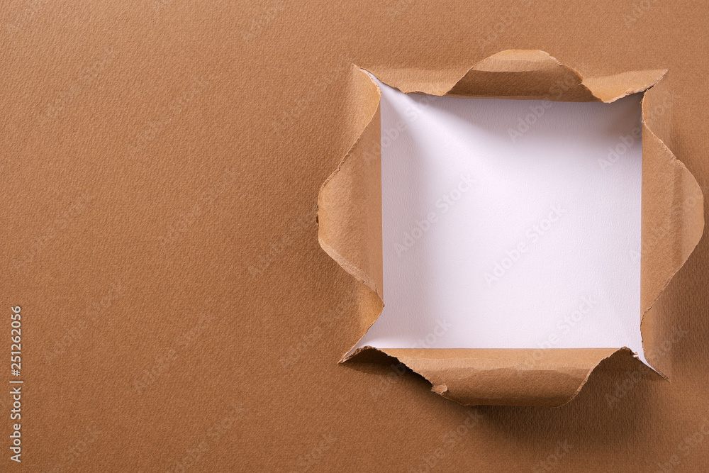 Torn brown paper square hole white background frame Stock Photo | Adobe ...