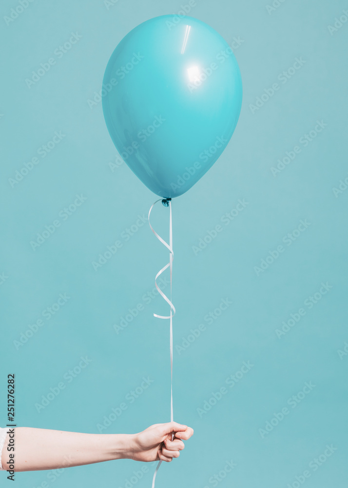 Helium balloon on a string Stock Photo | Adobe Stock