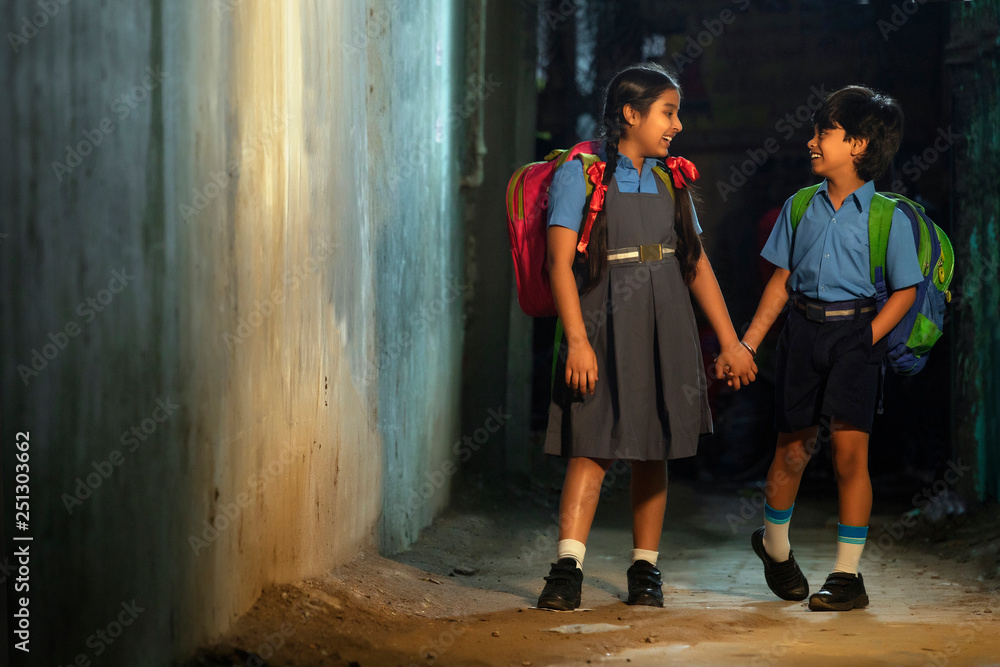 Two School Student walking to school while carrying backpack Two School ...