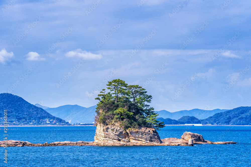 Many small islands over the blue ocean in sunny day, famous Kujukushima ...