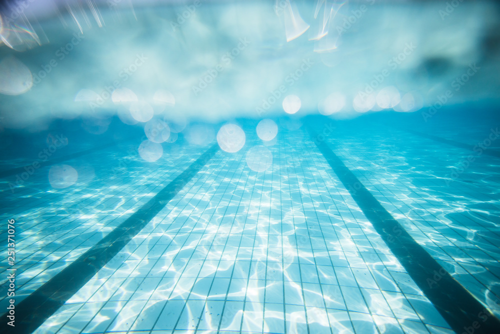 Wide angle underwater photo inside an olympic sized swimming pool with ...