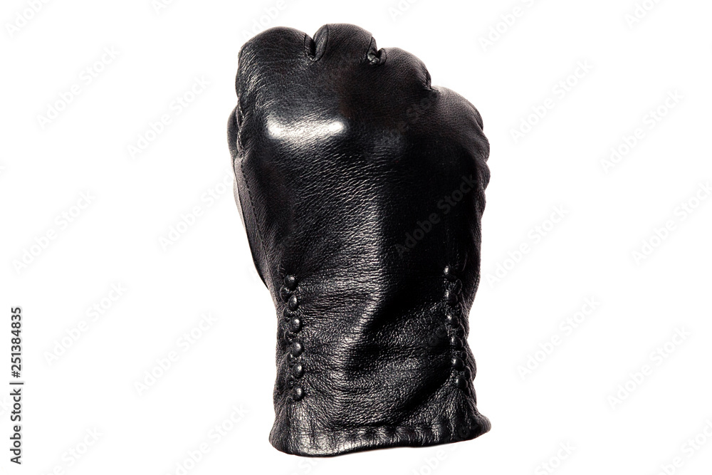 Closeup black leather glove, fingers showing fist sign. Isolated on white background. Concept ...