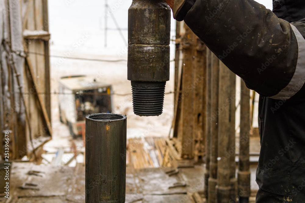 Offshore oil rig worker prepare tool and equipment for perforation oil ...