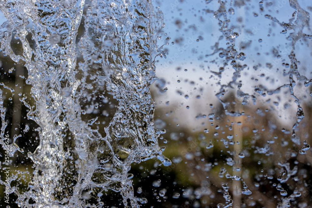 water splash on blurred background Stock Photo | Adobe Stock