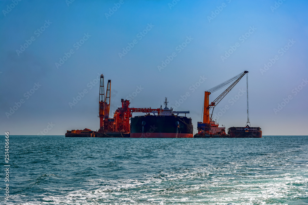 Loading ocean-going bulk carrier ship with Bauxite aluminum ore from ...