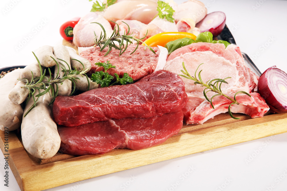 raw meat. Different types of raw pork meat, chicken and beef with ...