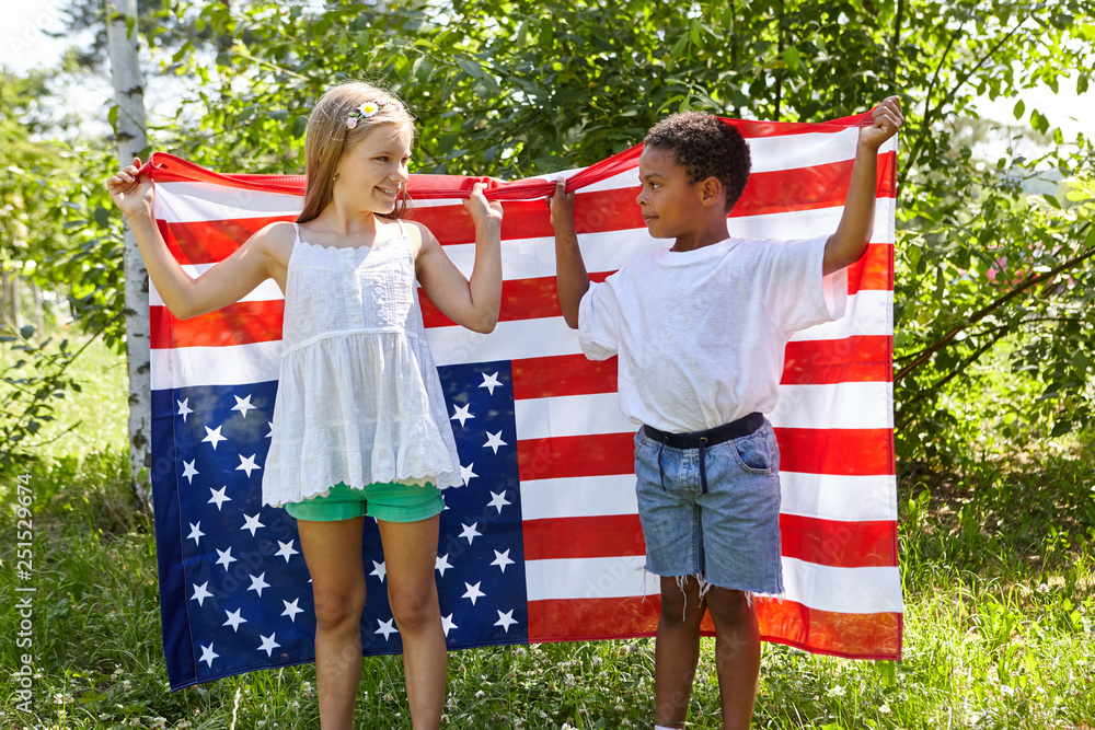 Friends hold together the flag of the USA Stock Photo | Adobe Stock