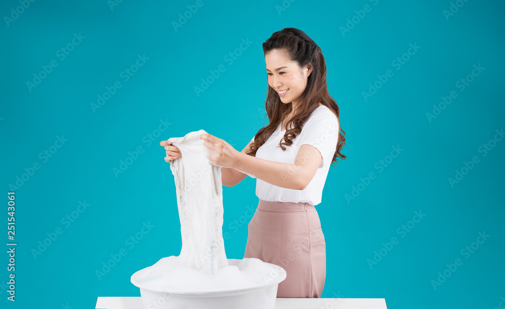 Woman Washing Clothes By Hand