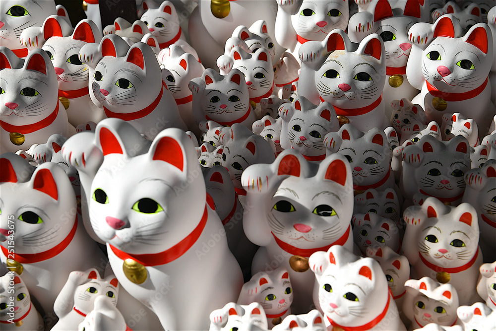 statues of cats in the Gotokuji temple in Japan. Stock Photo | Adobe Stock