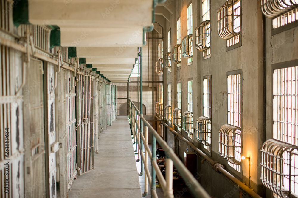 Cells of an empty derelict prison. Stock Photo | Adobe Stock