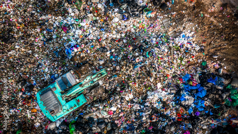 Garbage pile in trash dump or landfill, Aerial view garbage trucks ...