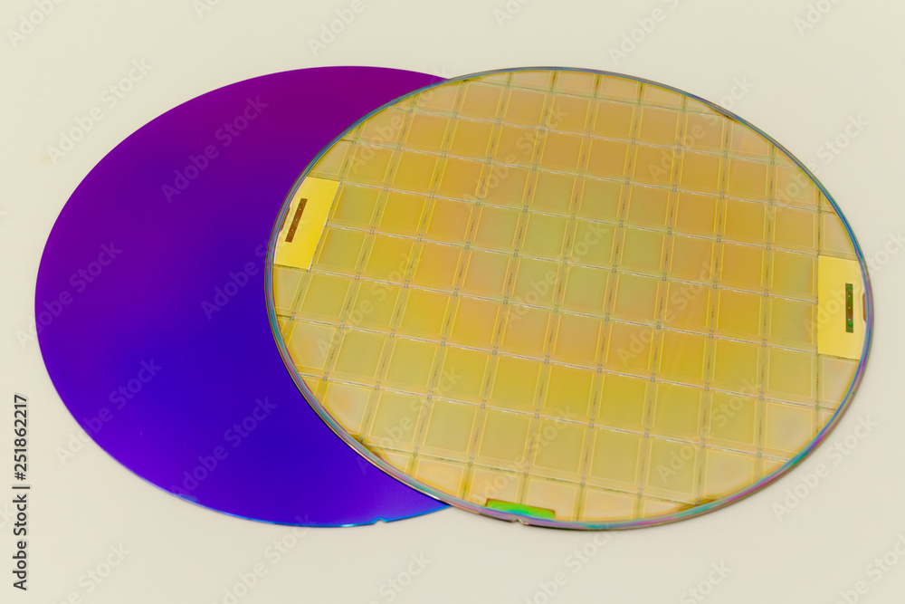 Silicon Wafers two types -empty grey wafer and gold wafes with ...