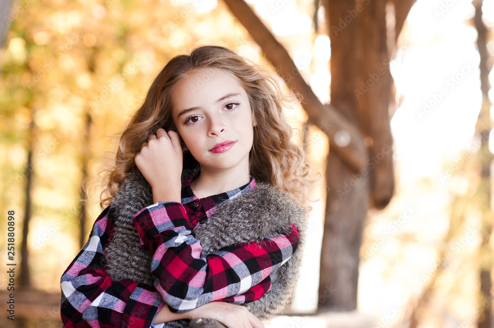 Beautiful blonde girl 14-15 year old posing over nature background ...