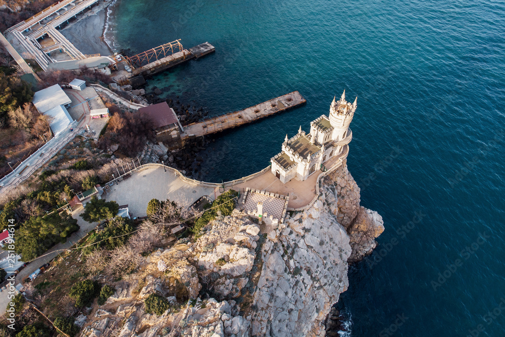 Swallow Nest aerial drone shot, ancient castle on top of mountain cliff ...