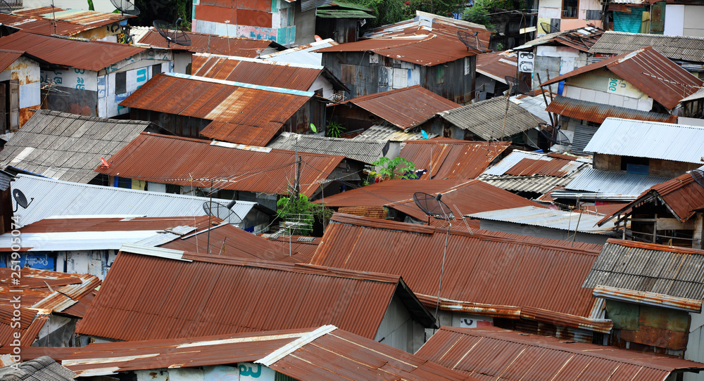 rusty roof of Poor house in big city , top view of house roof of slum ...