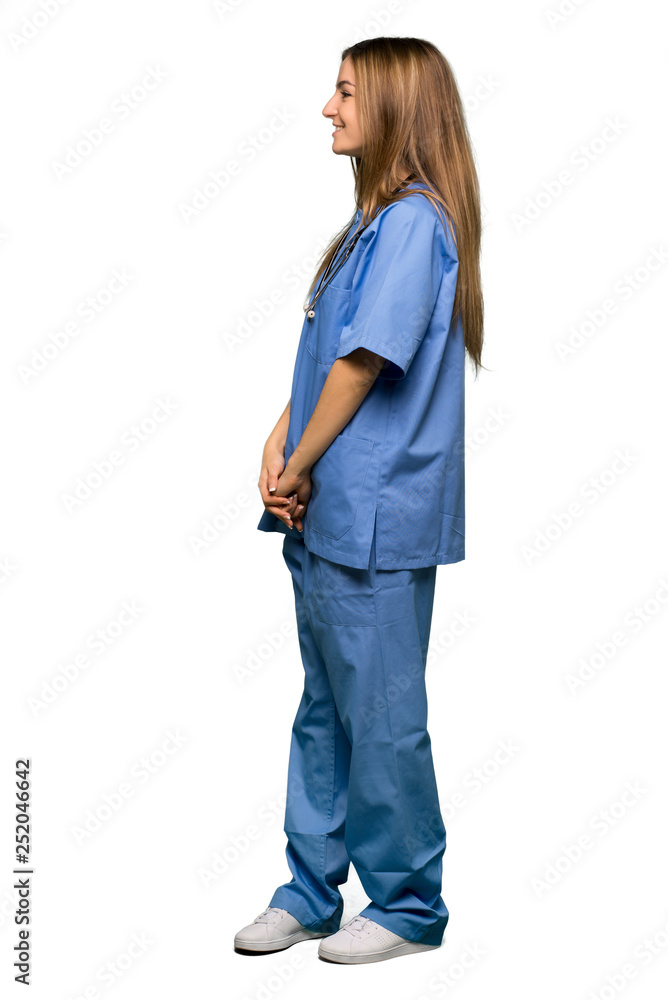 Full body Young nurse in lateral position on isolated background Stock ...