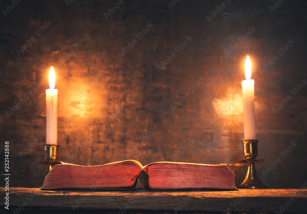 Open Bible With Candle