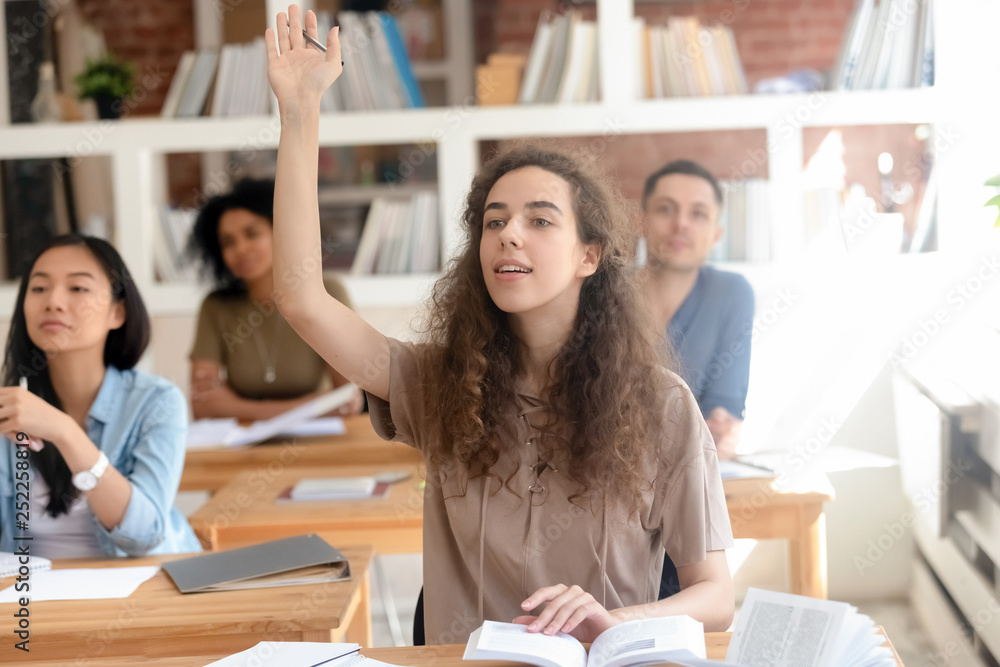 College Students Raising Hands