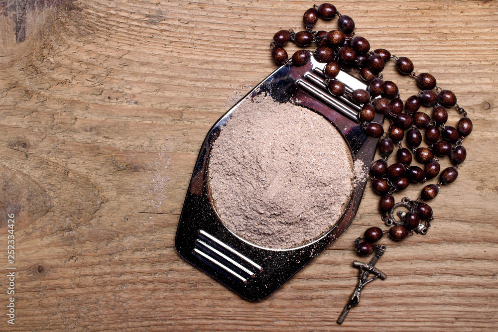 Old rosary and ash - symbols of Ash Wednesday. Top view Stock Photo ...