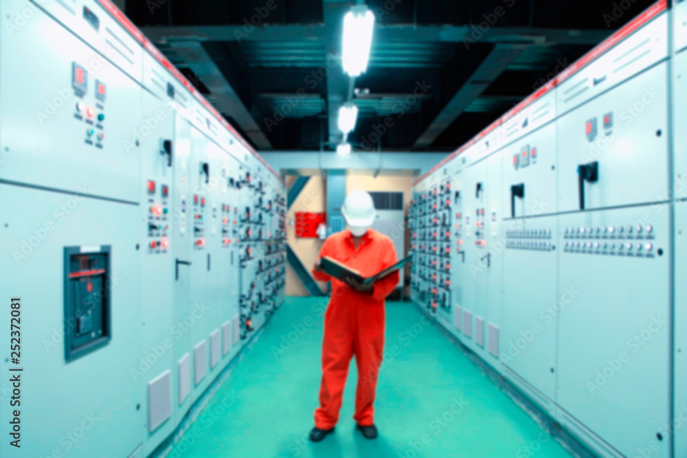 Engineer checking and monitoring the electrical system in Electrical ...