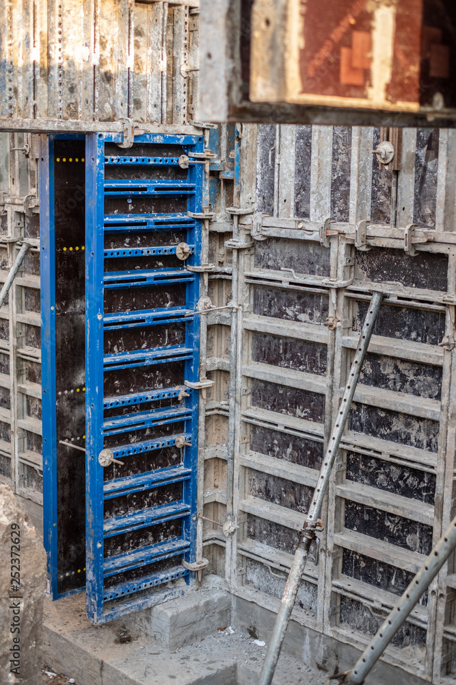 construction of the building, concrete pouring of metal reinforcement ...