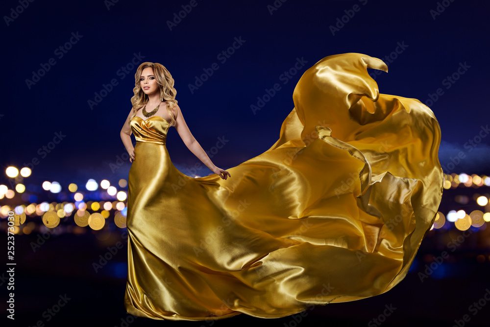 Woman in Gold Dress over Night City, Fashion Model in Long Golden Gown ...