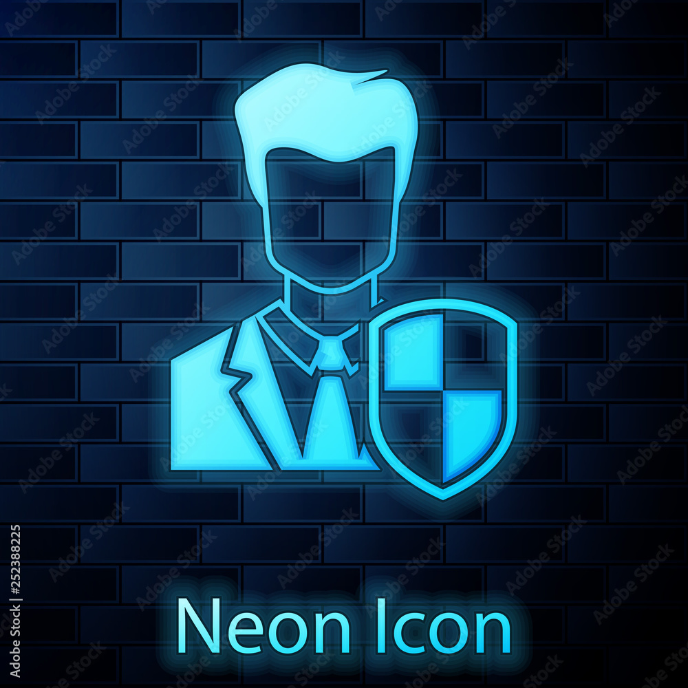Glowing neon User protection icon isolated on brick wall background ...