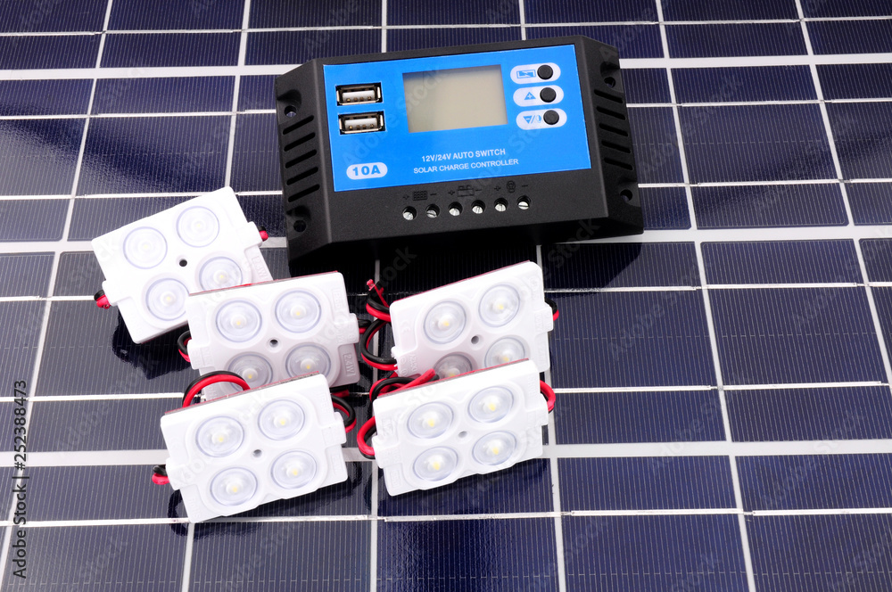 Solar lighting kit with lights and charger control unit on a solar ...