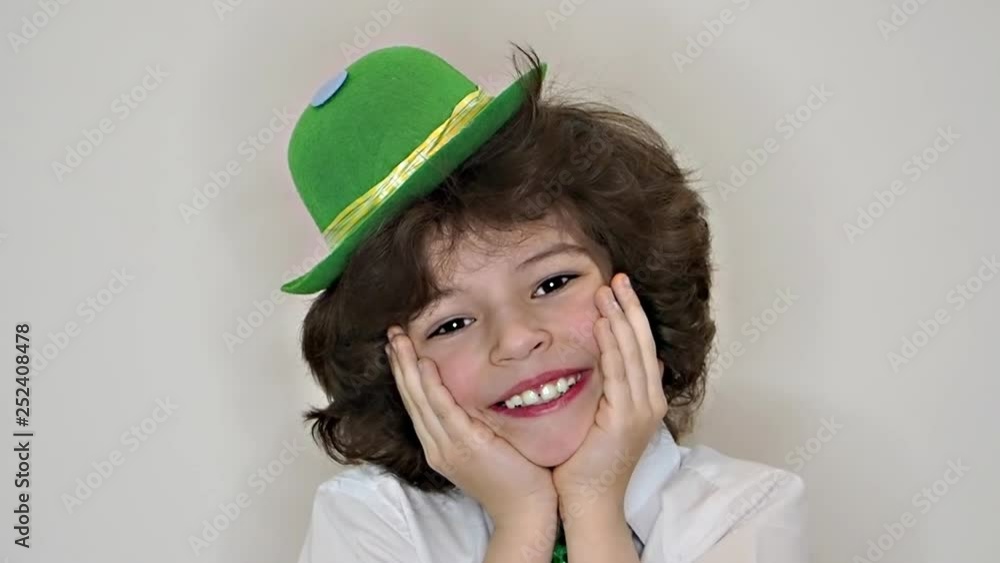 Child Celebrating St. Patrick's Day Laughing and Looking at Camera. A ...