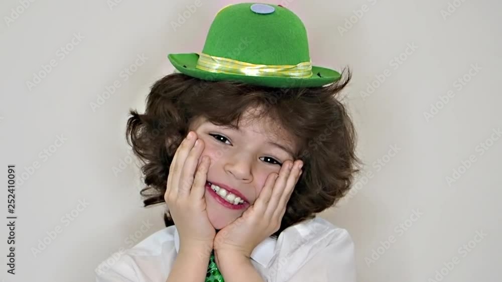 Child Celebrating St. Patrick's Day Laughing and Looking at Camera. A ...