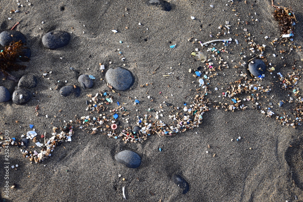 Microplastics on a beach. Famara Beach, Lanzarote. Stock Photo | Adobe ...