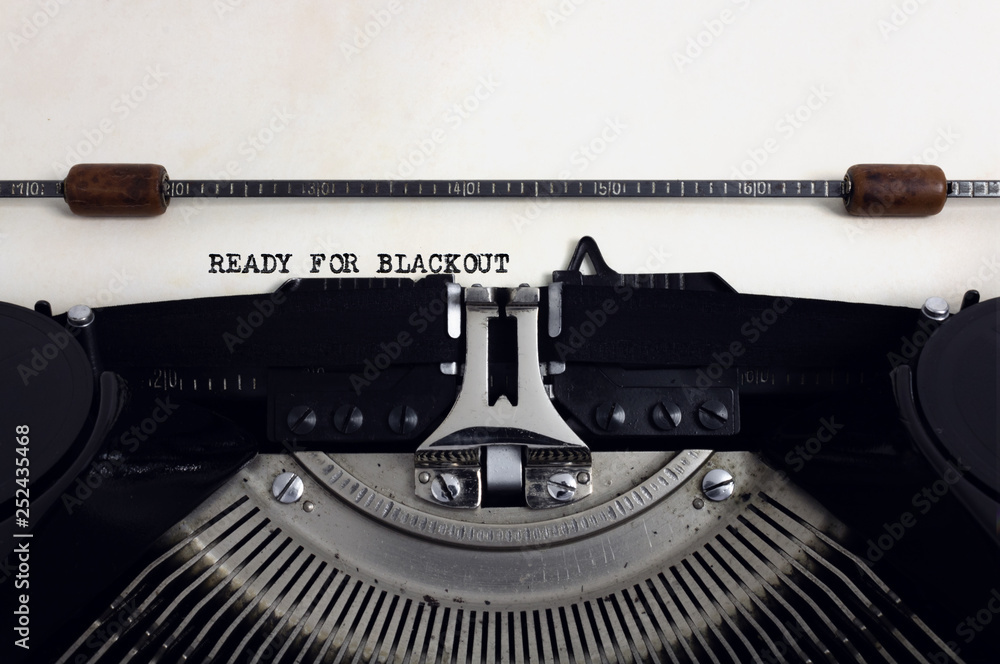 Old retro vintage black typewriter with close-up typing text Ready for ...
